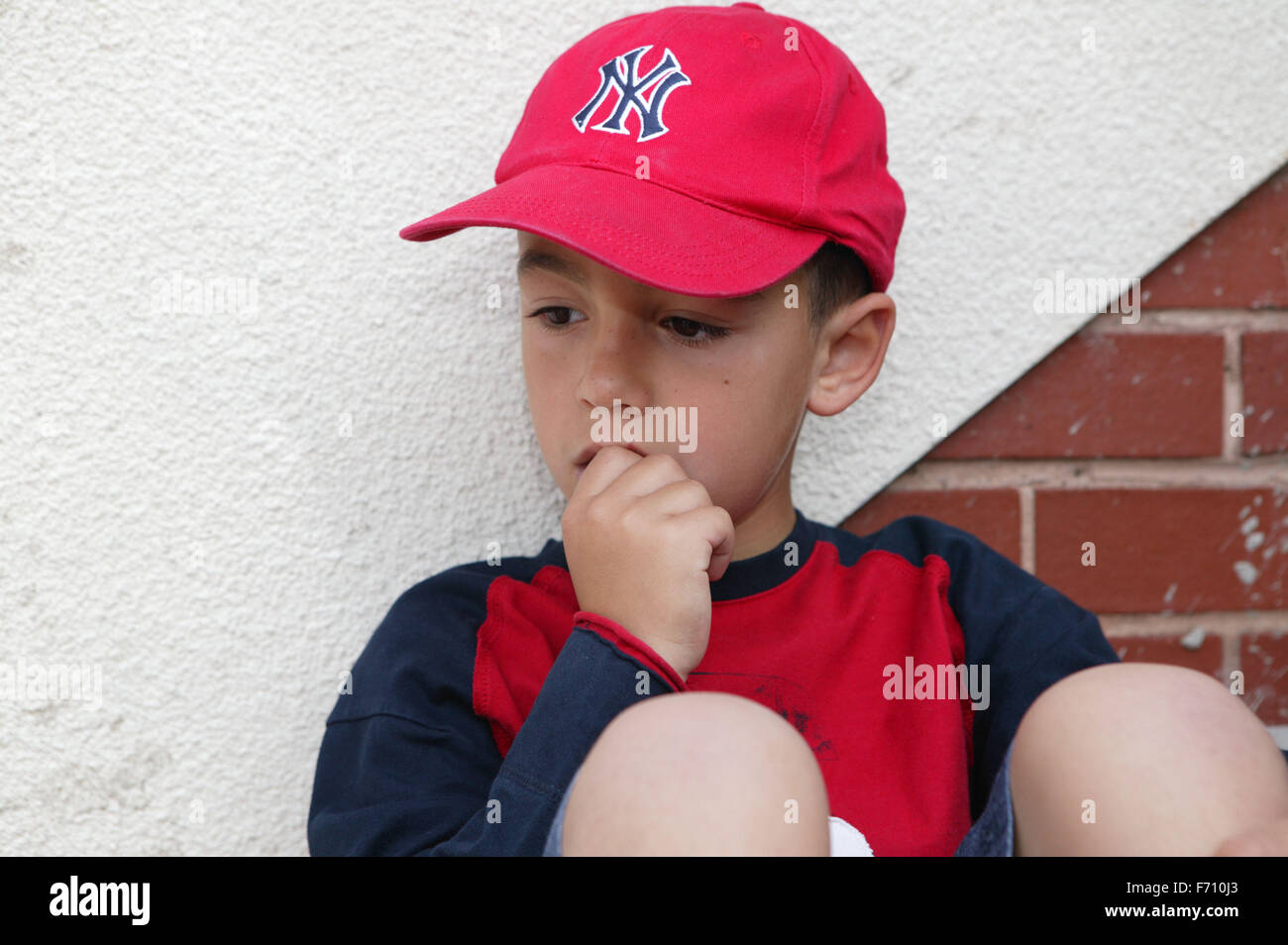 Young boy alone Stock Photo - Alamy
