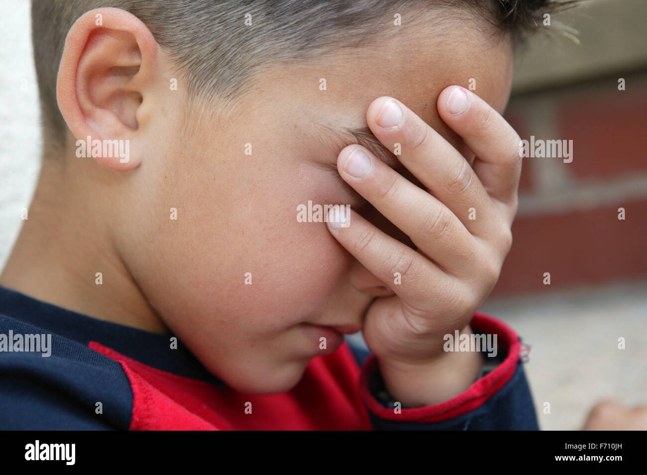 Young boy alone Stock Photo - Alamy