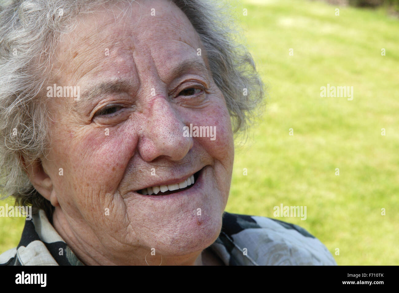 Portrait of Elderly woman smiling Stock Photo - Alamy