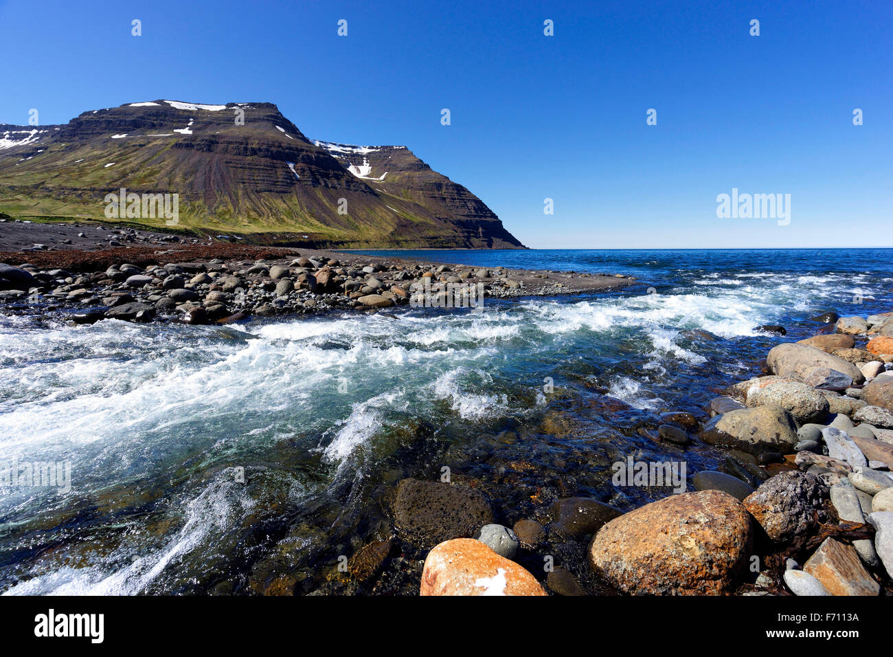 Fast flowing coastal stream, Westfjords, Iceland, Europe Stock Photo ...