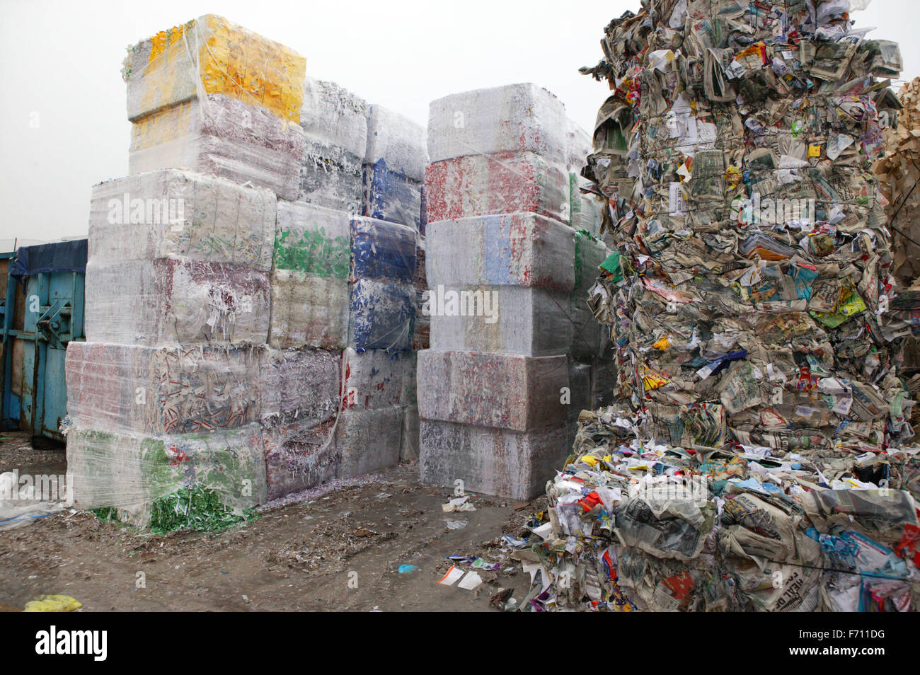 Stacks of paper bales ready for distribution to papermill for recycling ...