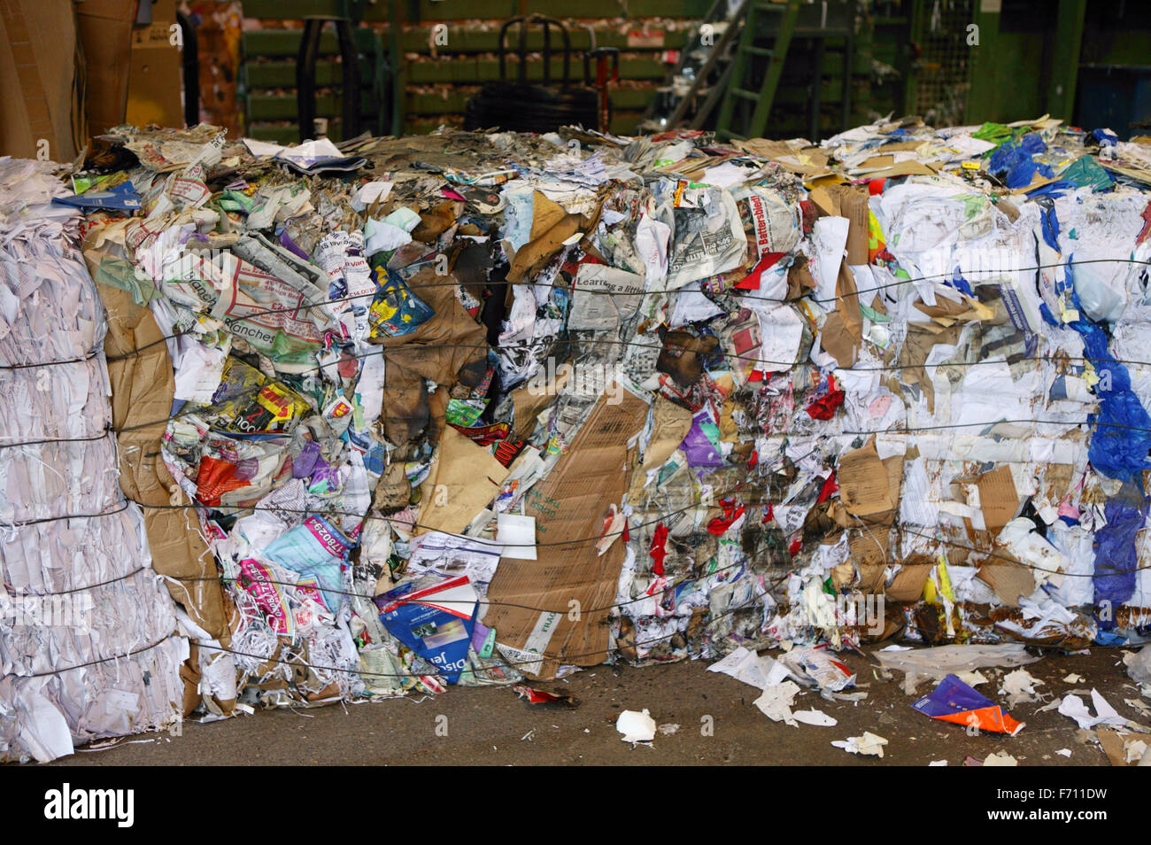 Assortment of cardboard and paper at collection point before sorting ...