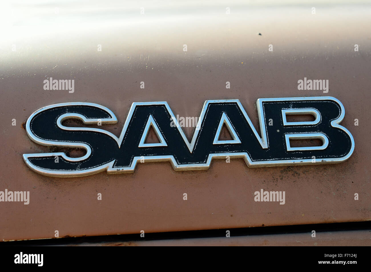 old worn saab badge on car Stock Photo - Alamy
