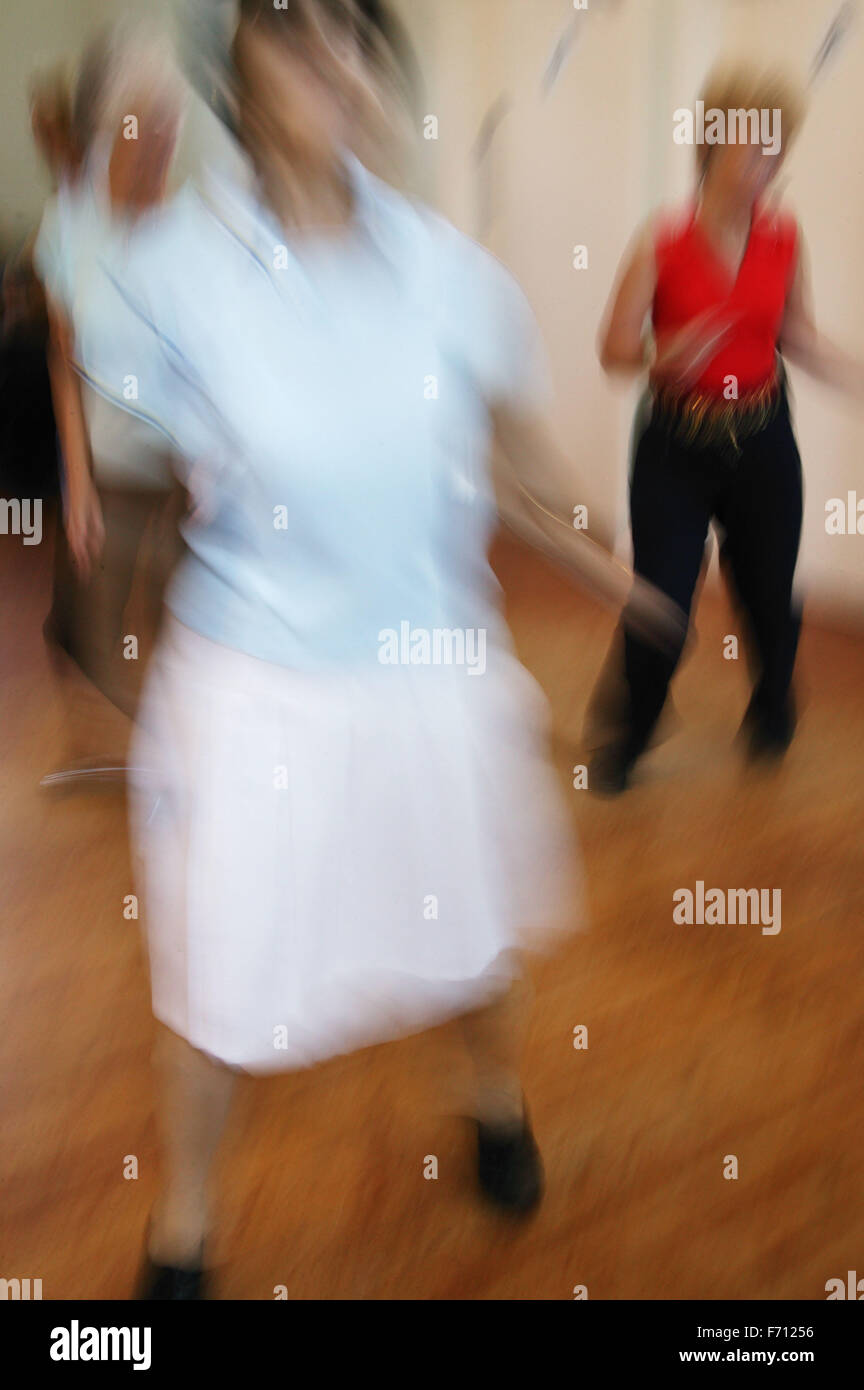 Women in Line Dancing Class Stock Photo - Alamy