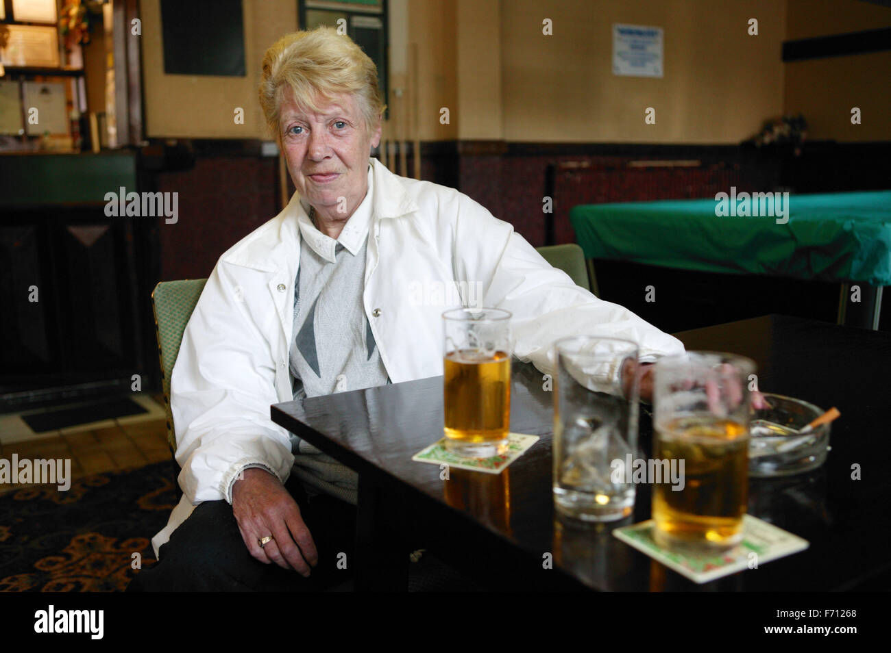 Old lady smoking and drinking hi-res stock photography and images - Alamy