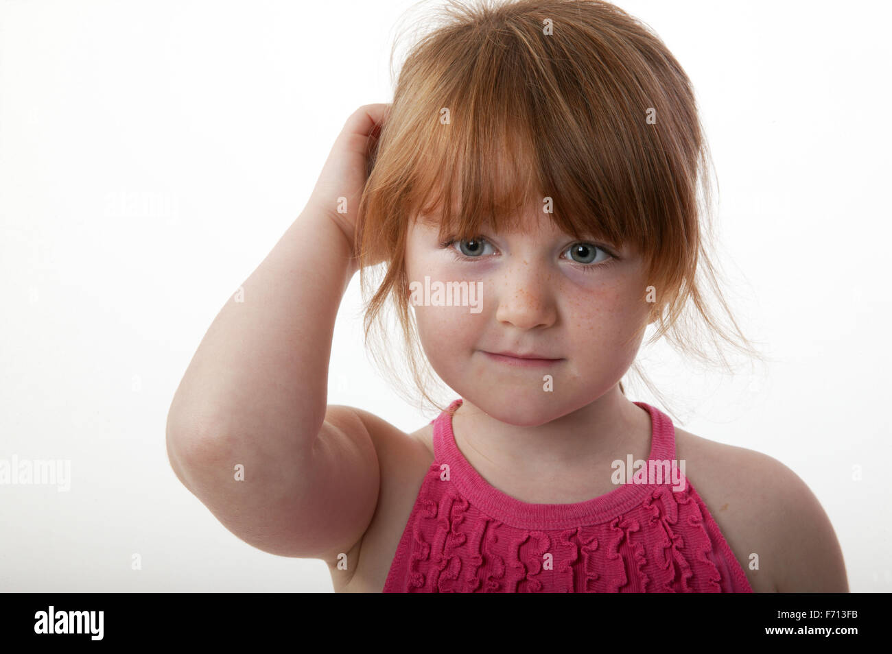 Portrait of a young girl looking puzzled Stock Photo - Alamy