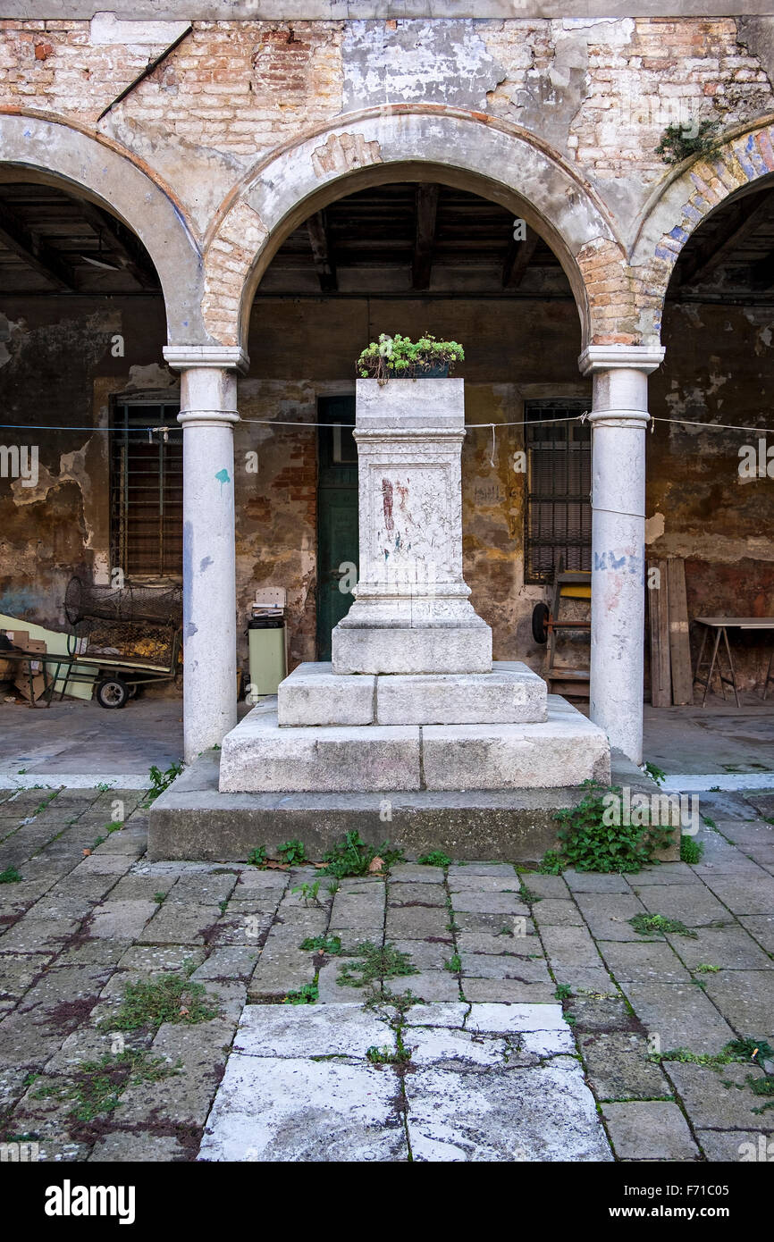 Venice. Cloister Courtyard of San Pietro di Castello church framed by ...