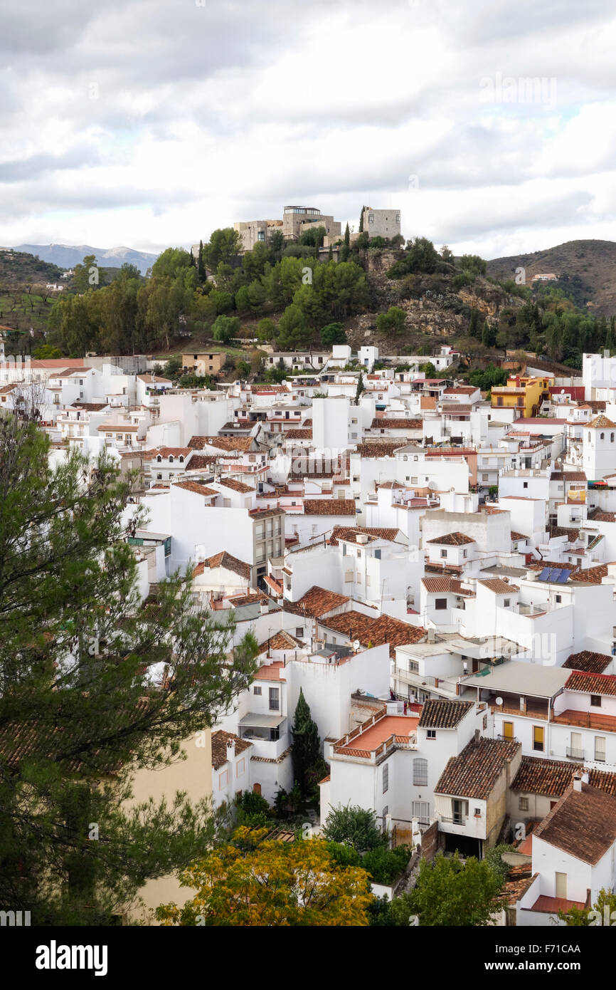 View of the white washed village of Monda with Al-Mundat Castle, Sierra ...