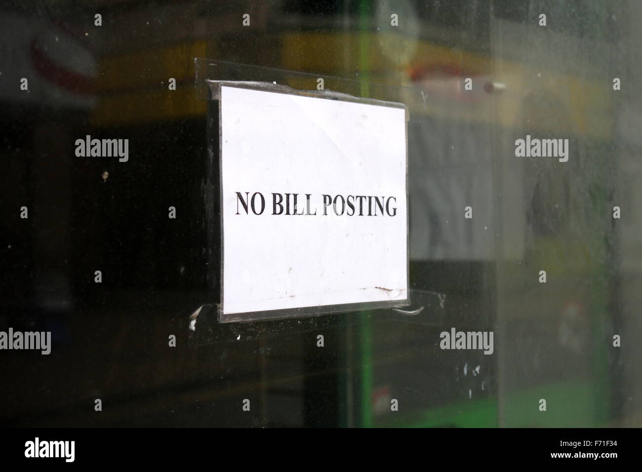 no bill posting sign notice on empty shop window in wales great britain ...