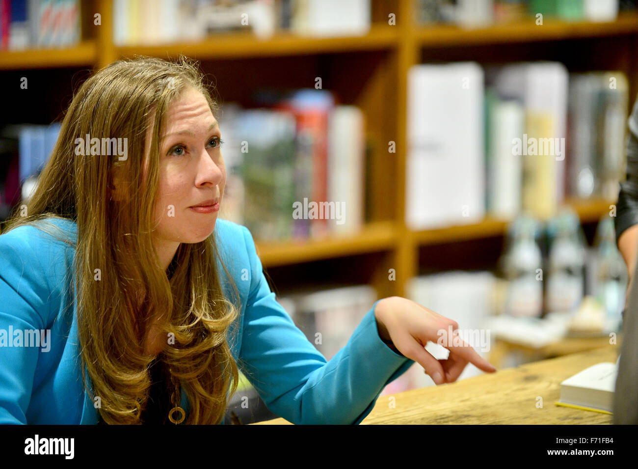 Chelsea Clinton signs copies of her new book 'It's Your World: Get ...