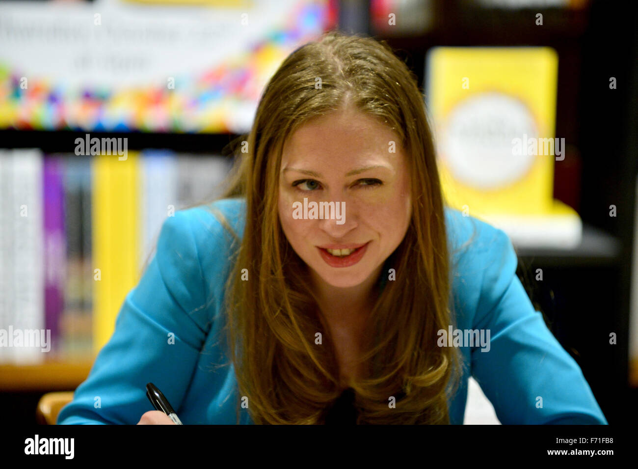 Chelsea Clinton signs copies of her new book 'It's Your World: Get ...