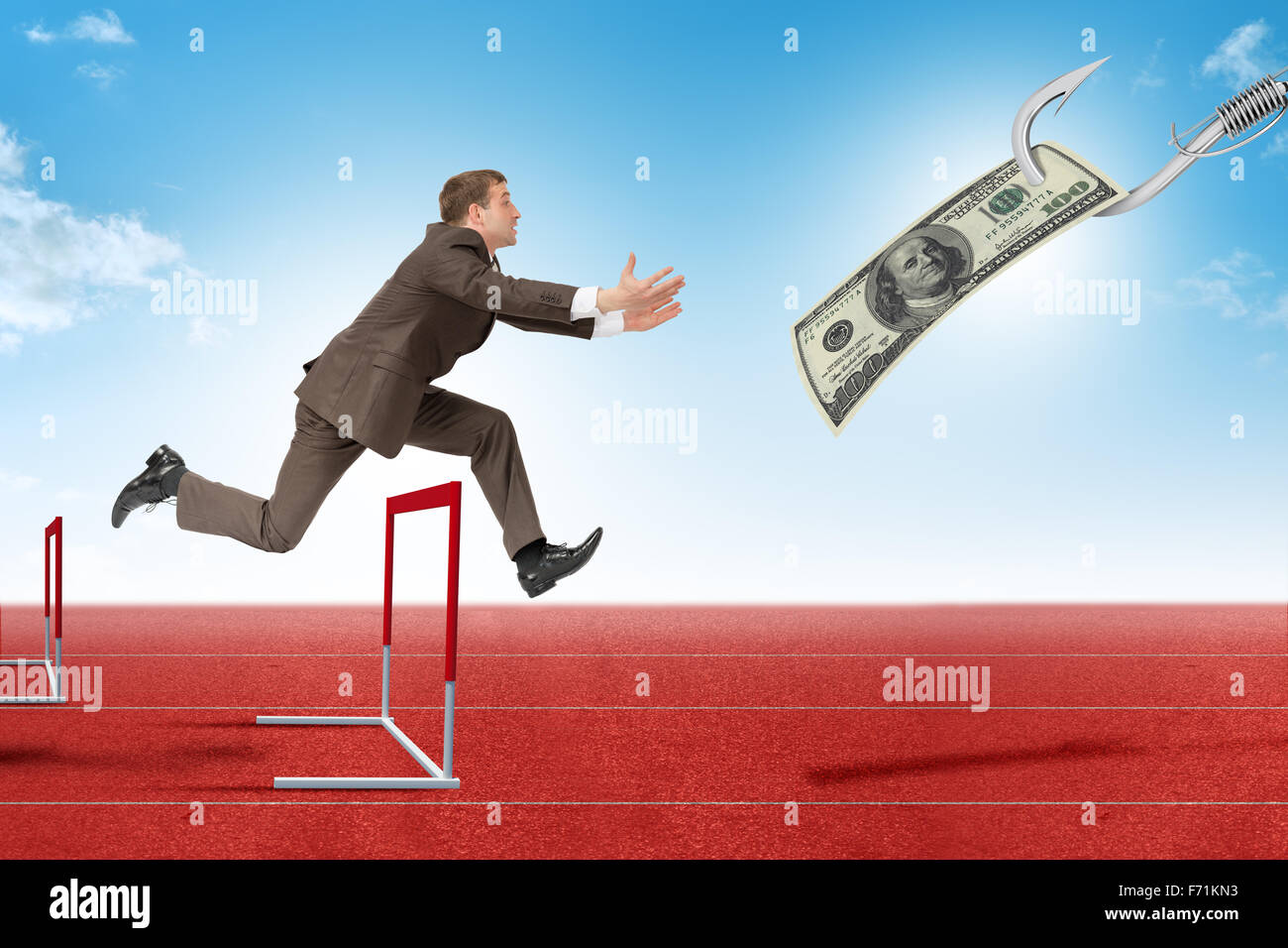 Man hopping over treadmill barrier with dollar Stock Photo - Alamy