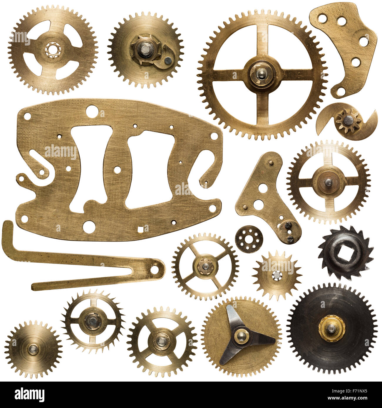 Clockwork spare parts. Metal gear, cogwheels and other details Stock ...