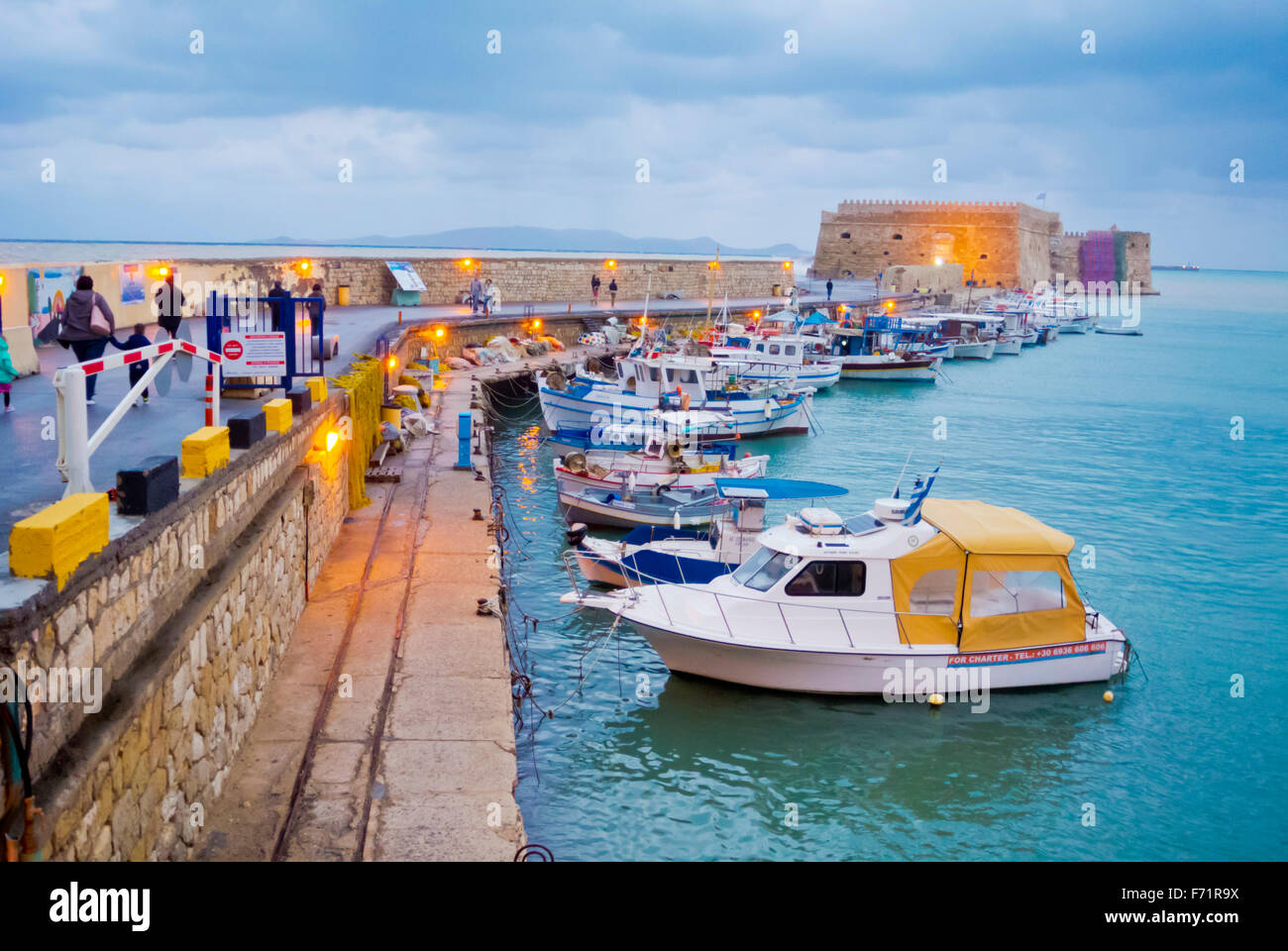 Old Venetian harbour, with Koulos fortress, Heraklion, Crete island ...