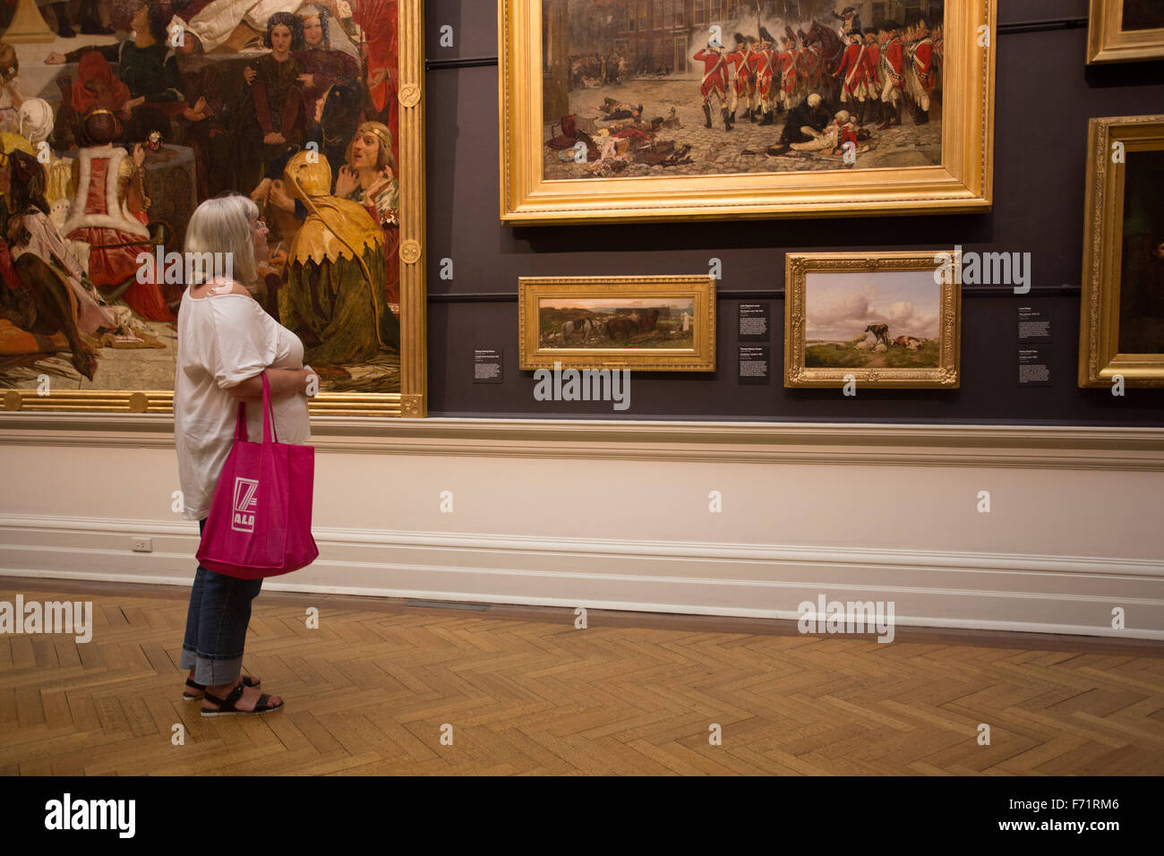 woman inside art gallery Stock Photo - Alamy