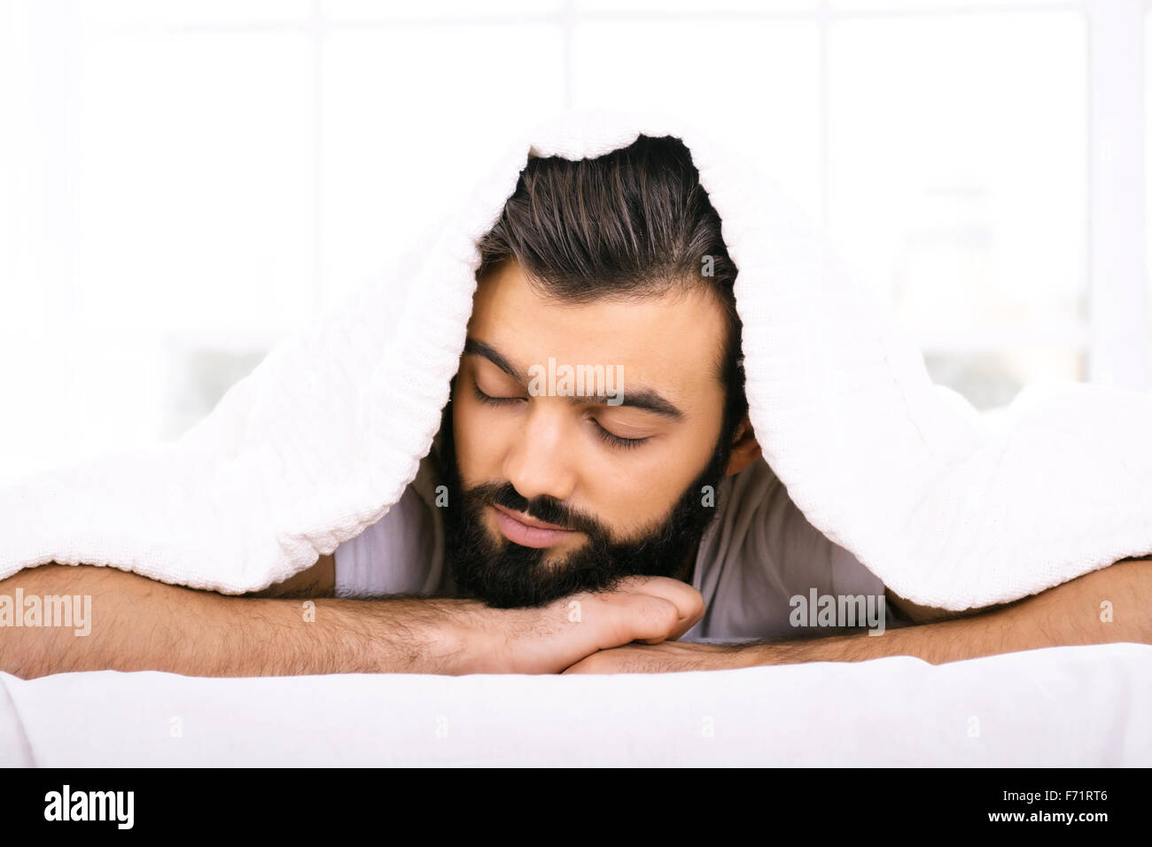 Sleepy young man in the morning Stock Photo - Alamy