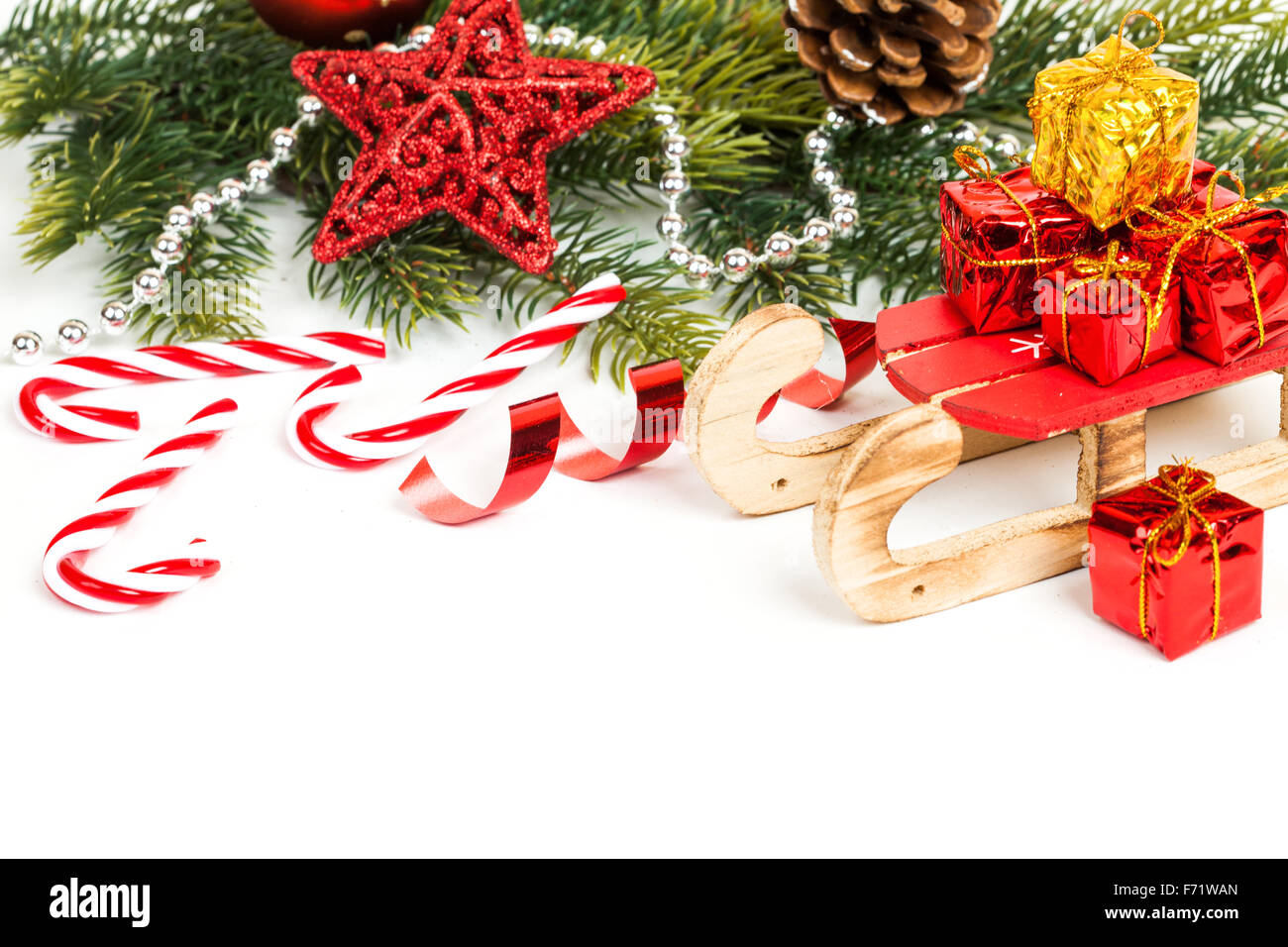 Bright christmas composition with sledge Stock Photo - Alamy