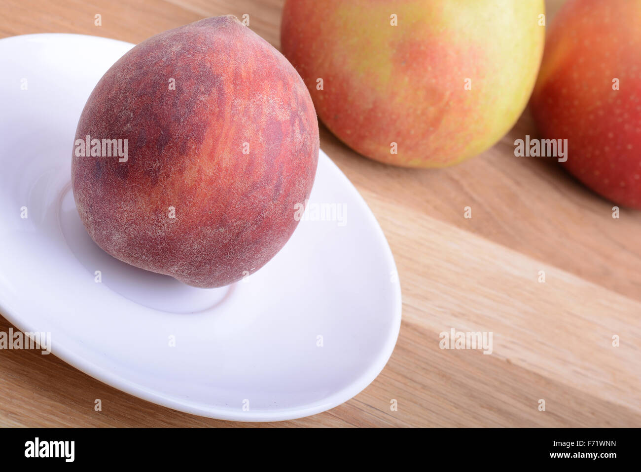 fruits on wodden table, peach, apple, food concept Stock Photo - Alamy