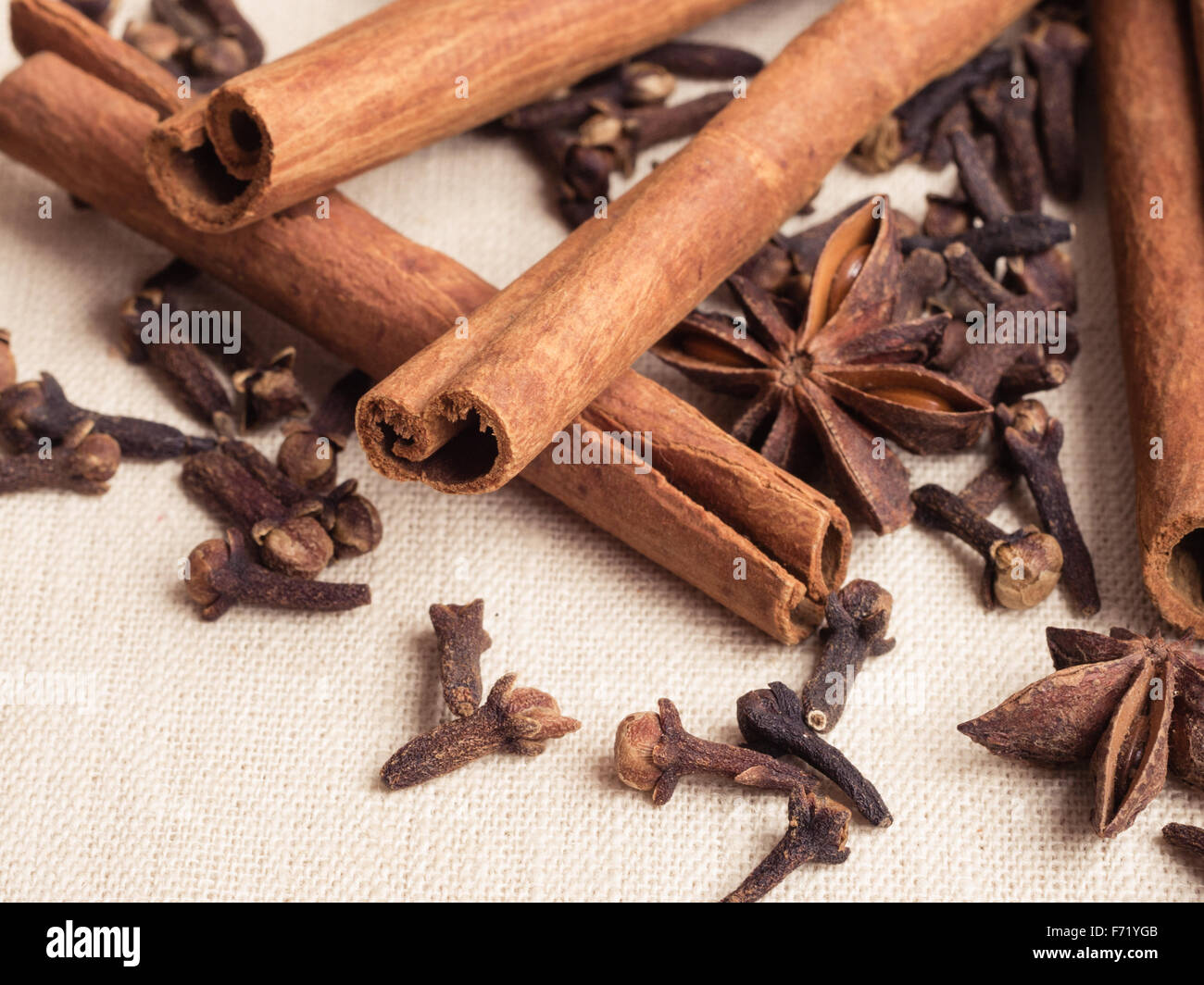 Spices for christmas cakes cinnamon sticks anise stars and cloves on ...