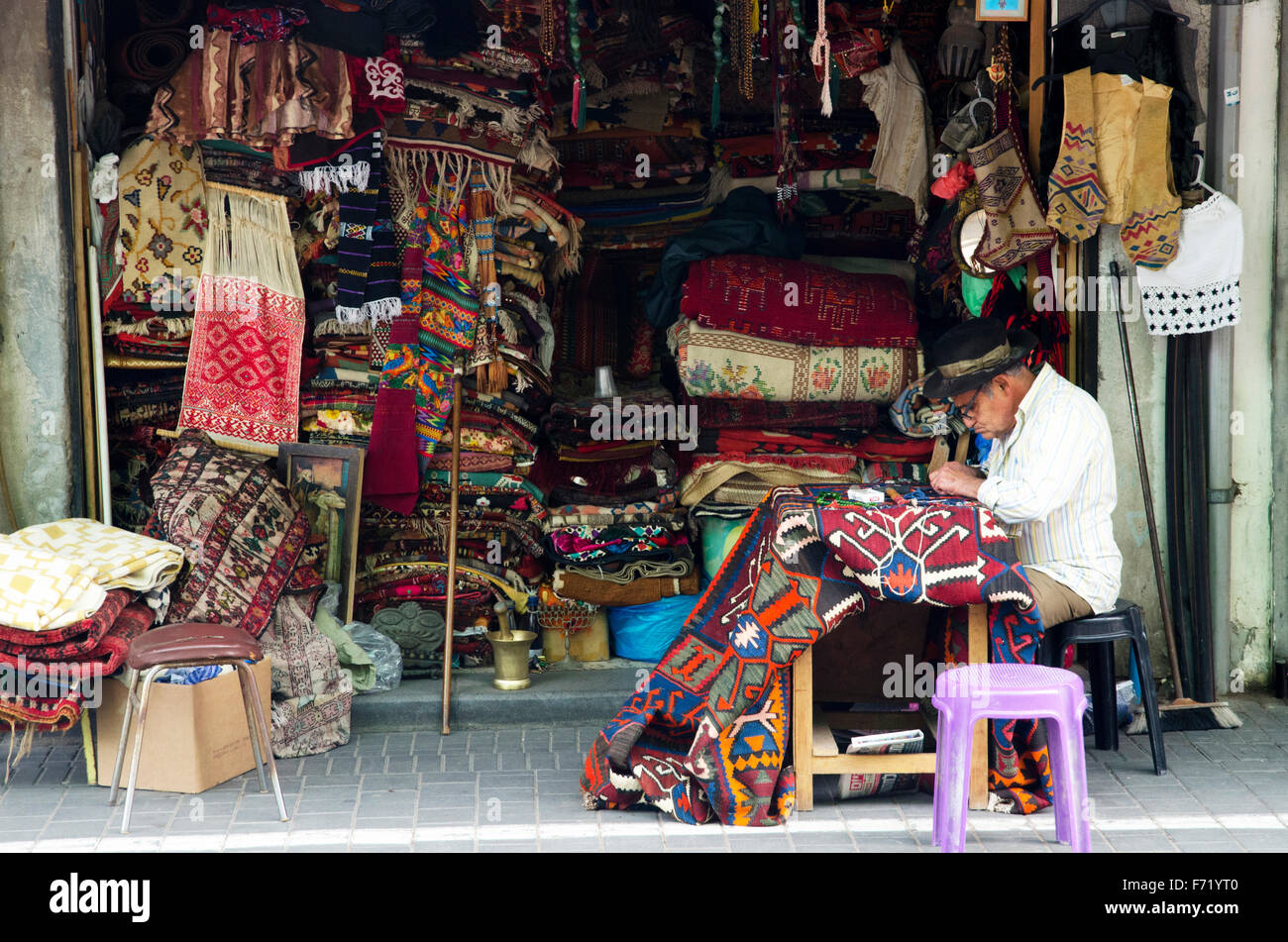 A man in a carpet stall in Jaffa, Israel Stock Photo - Alamy