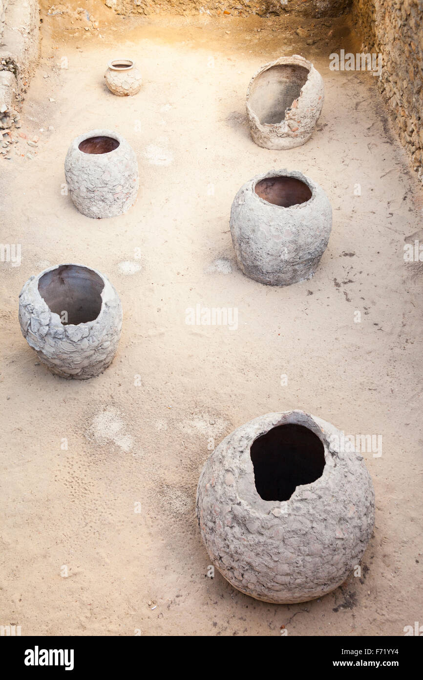 Ancient pots in archaeological site of a Roman bath, beside the ...