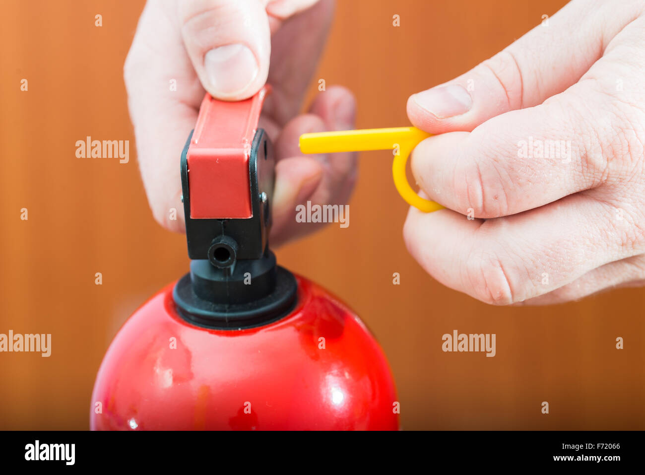 fire extinguisher in human hand Stock Photo - Alamy