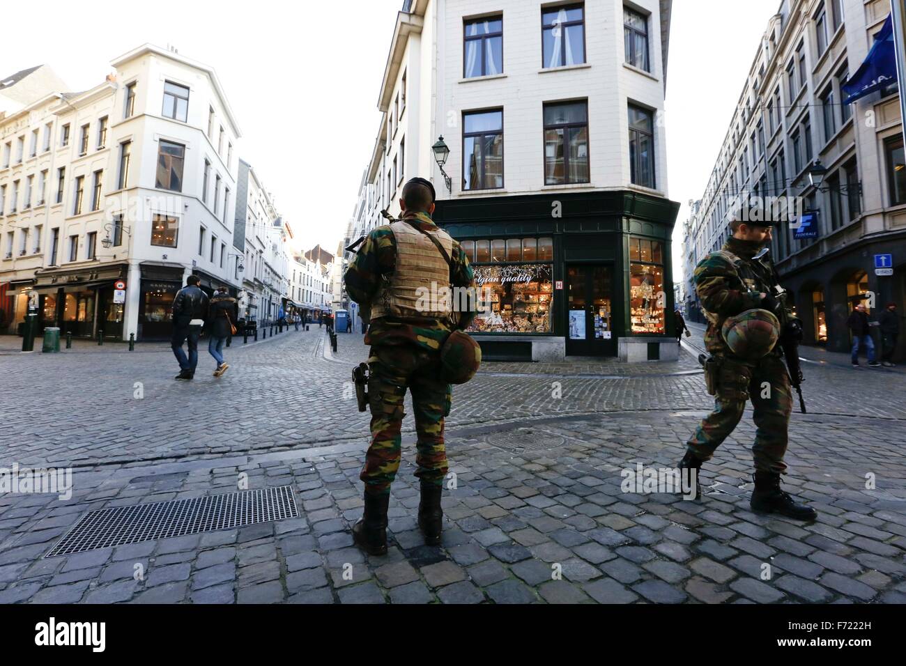 Brussels, Belgium. 23rd Nov, 2015. Soldiers guard a crossroad in ...