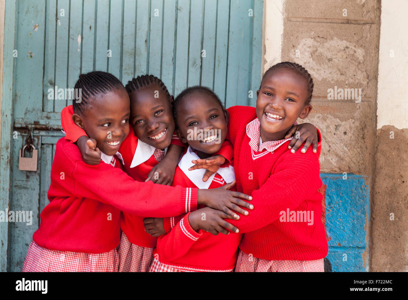 Young Kenyan girls smile at the Johari Junior Academy May 6, 2013 in ...