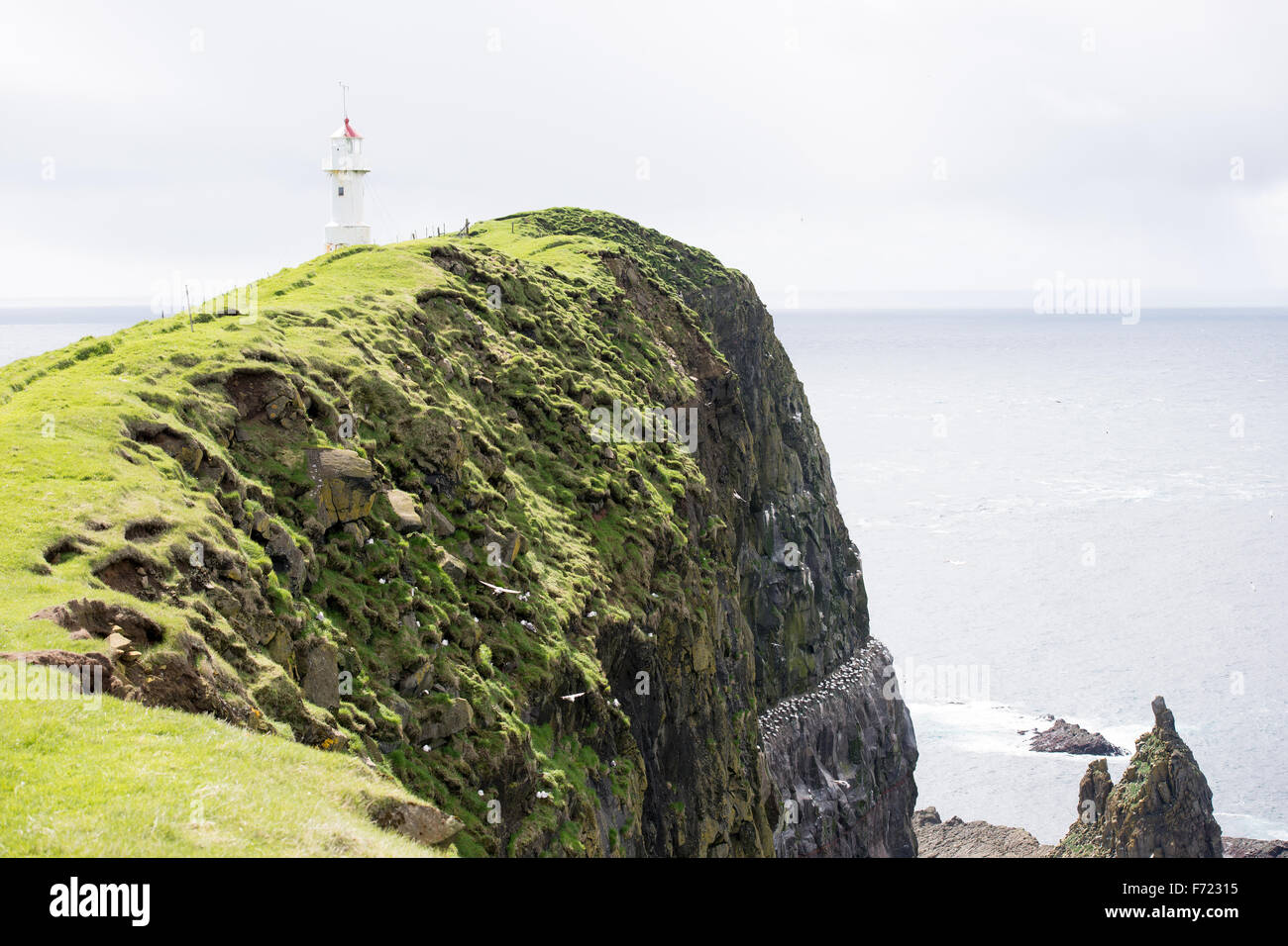 Lighthouse on Mykines Holmur Stock Photo - Alamy