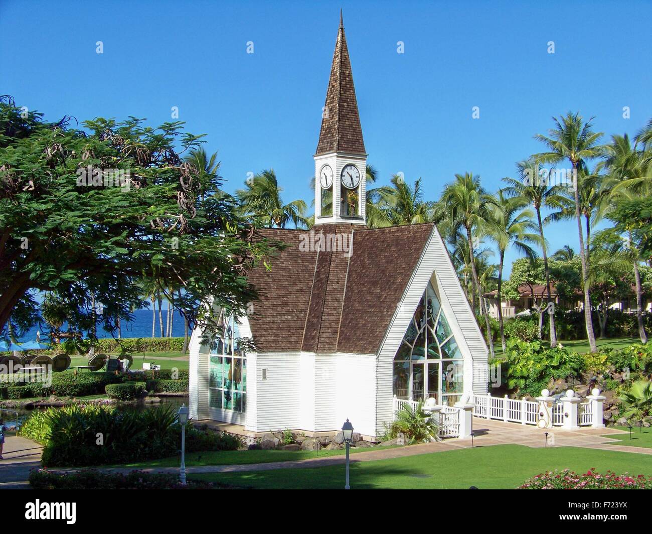 Church scape with ocean background and lush grounds Stock Photo - Alamy