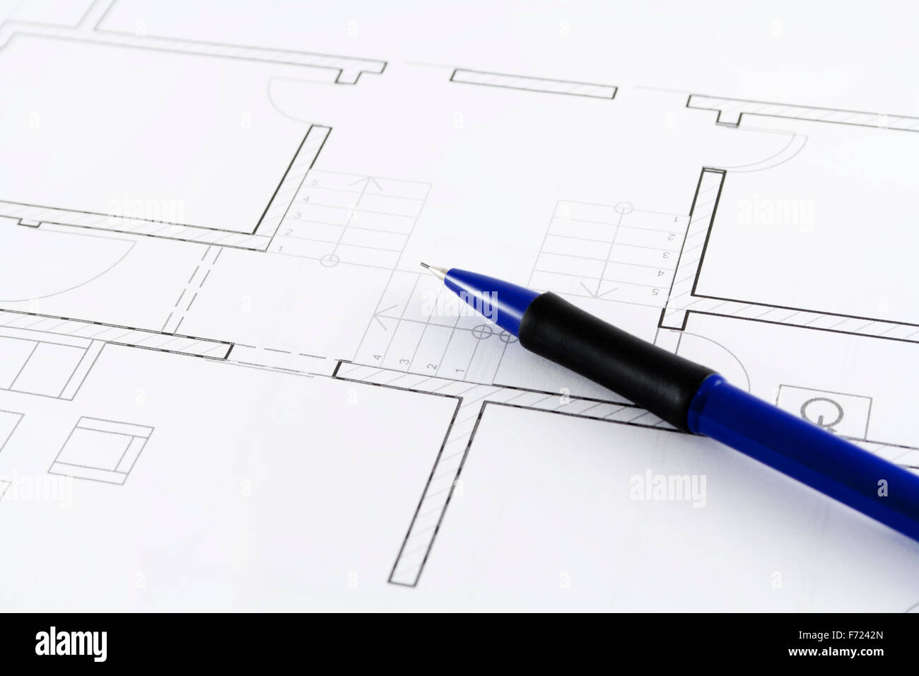 Architecture blueprint and blue pencil on a paper Stock Photo - Alamy