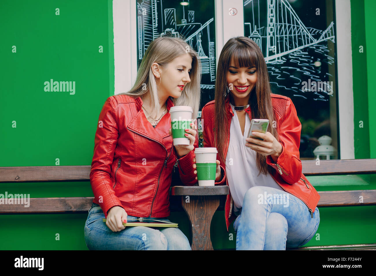 girls with phone Stock Photo - Alamy