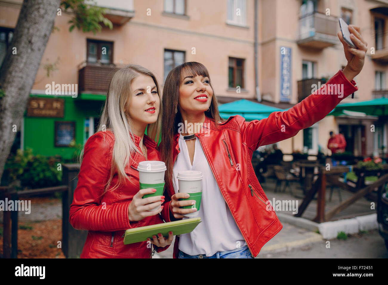 girls with phone Stock Photo - Alamy