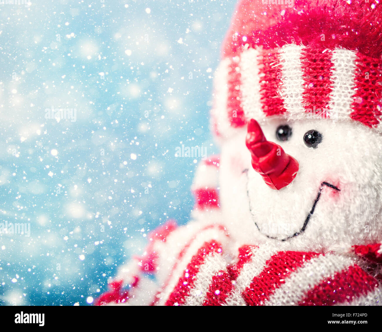 Funny snowman portrait against snowfall, abstract christmas backgrounds ...