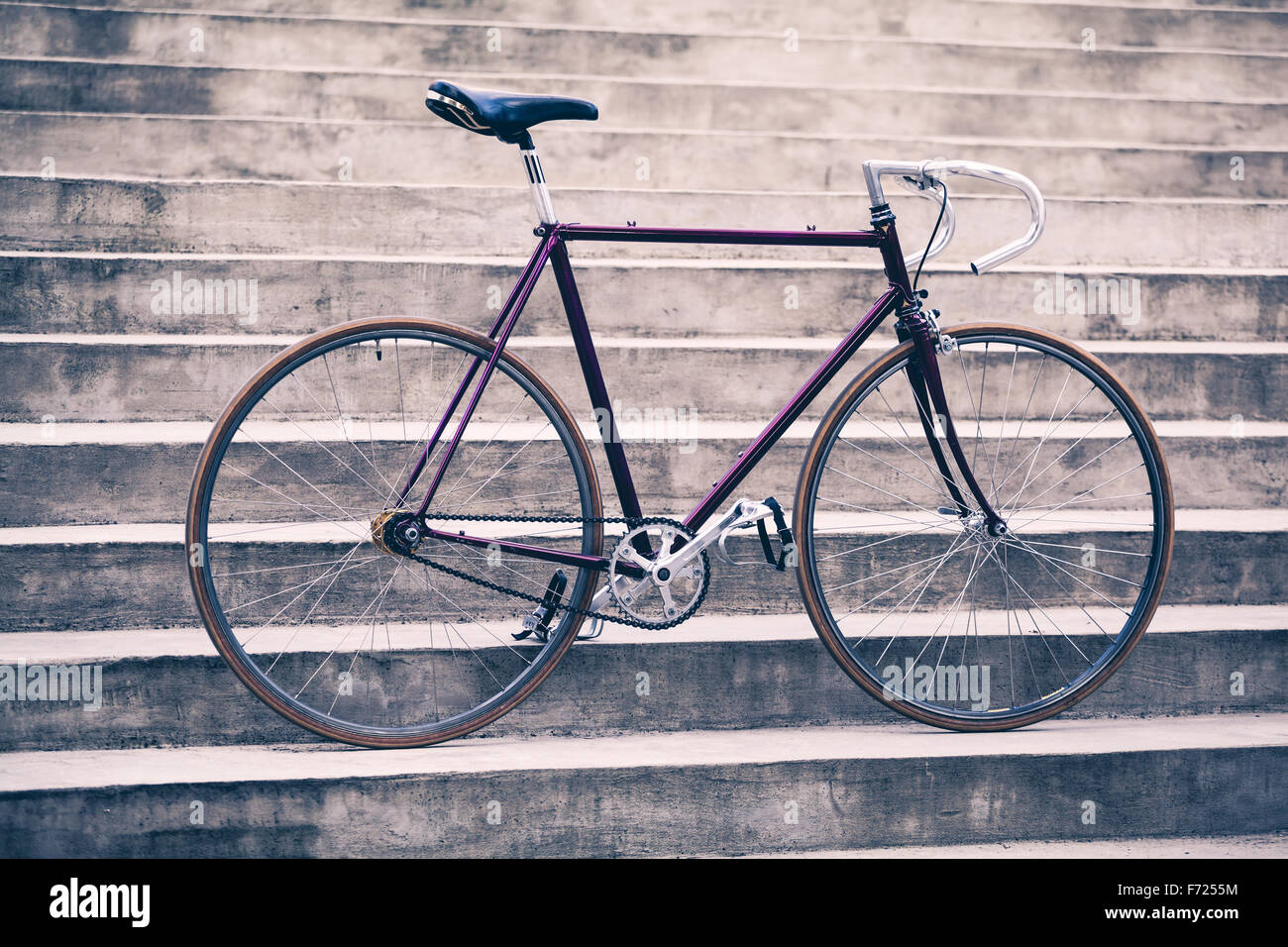 Road bicycle, fixed gear bike on city concrete street. Urban industrial ...
