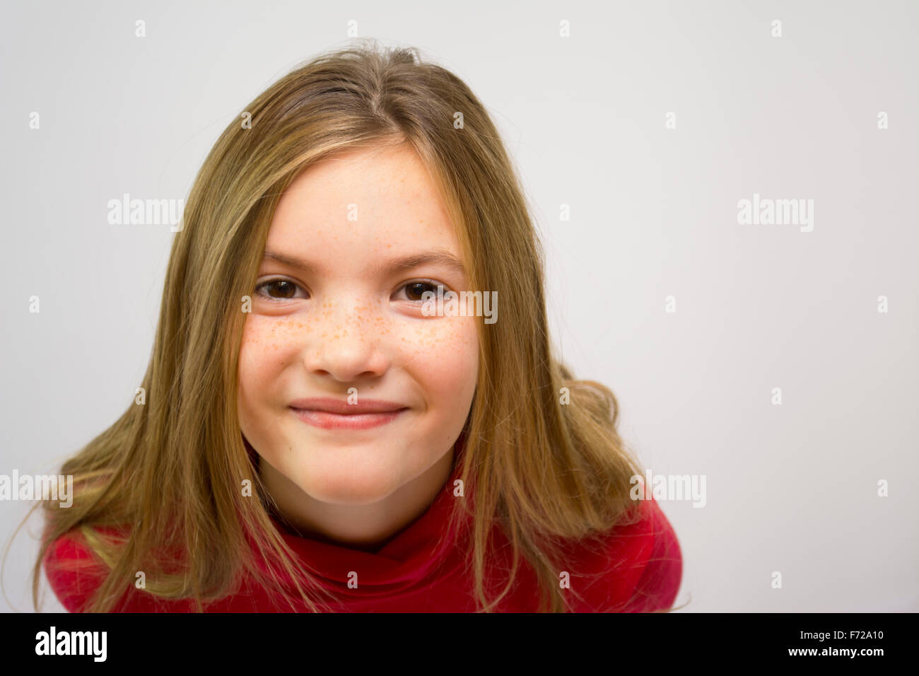 Smiling and cute girl Stock Photo - Alamy