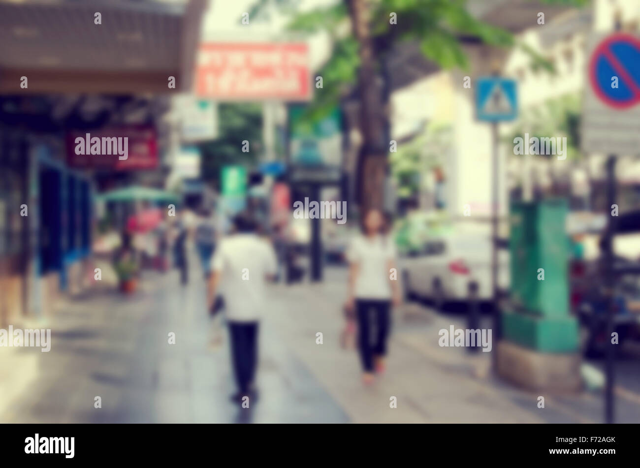 out of focus picture of a crowd of people walking in the city Stock ...