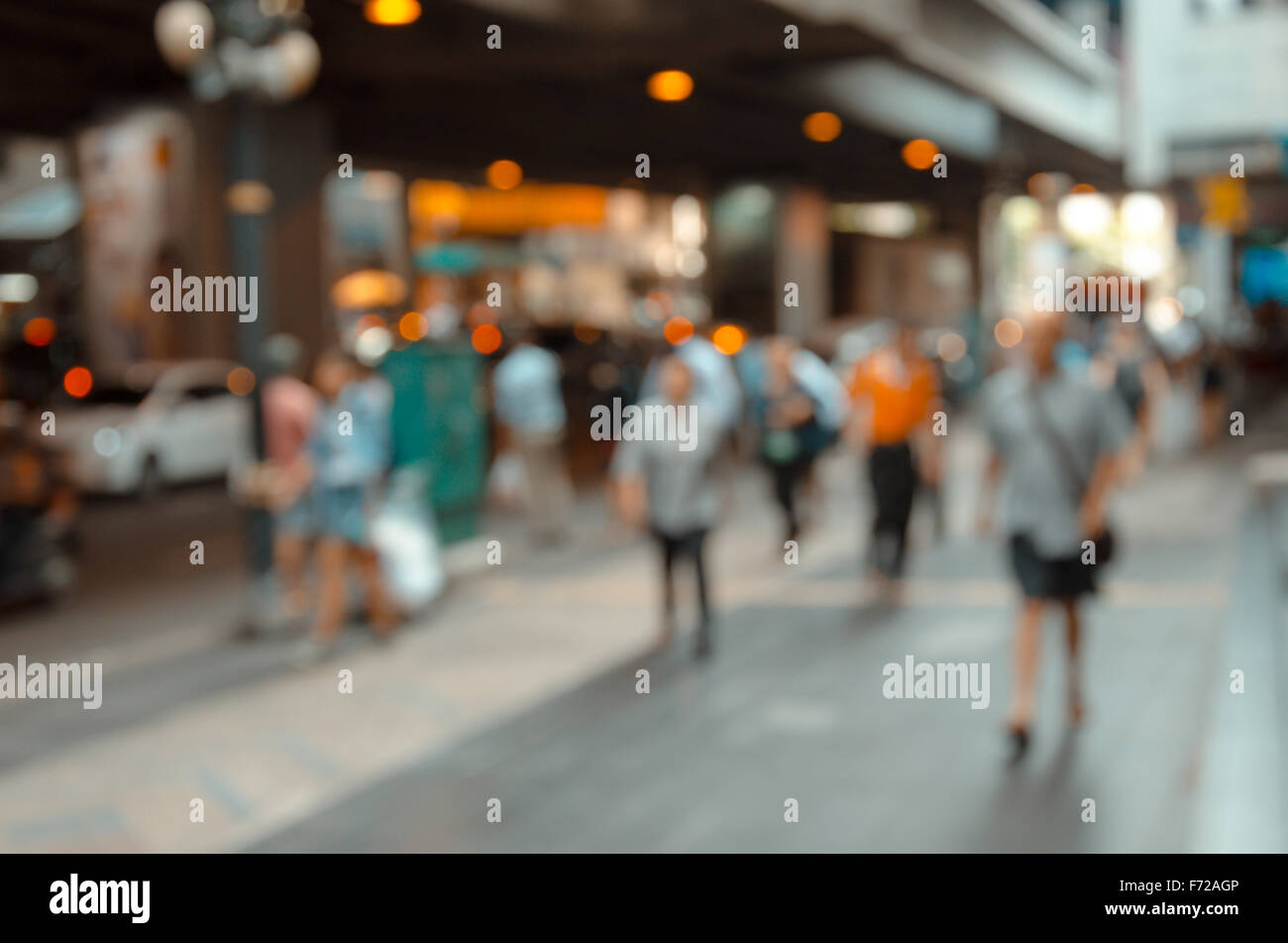 out of focus picture of a crowd of people walking in the city Stock ...