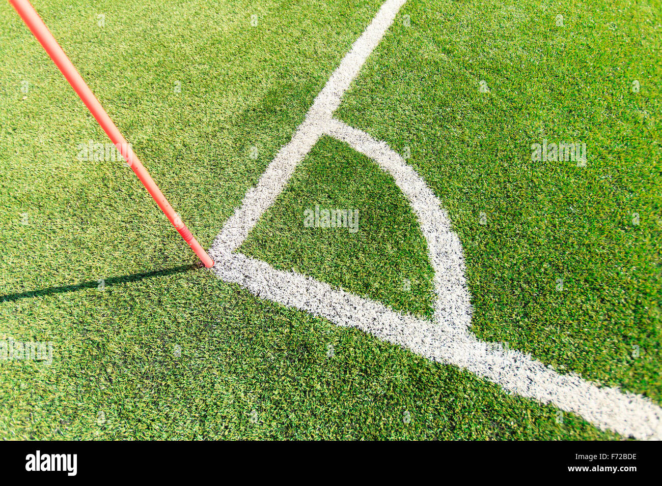 place a corner kick (in football). flag staking this territory Stock ...