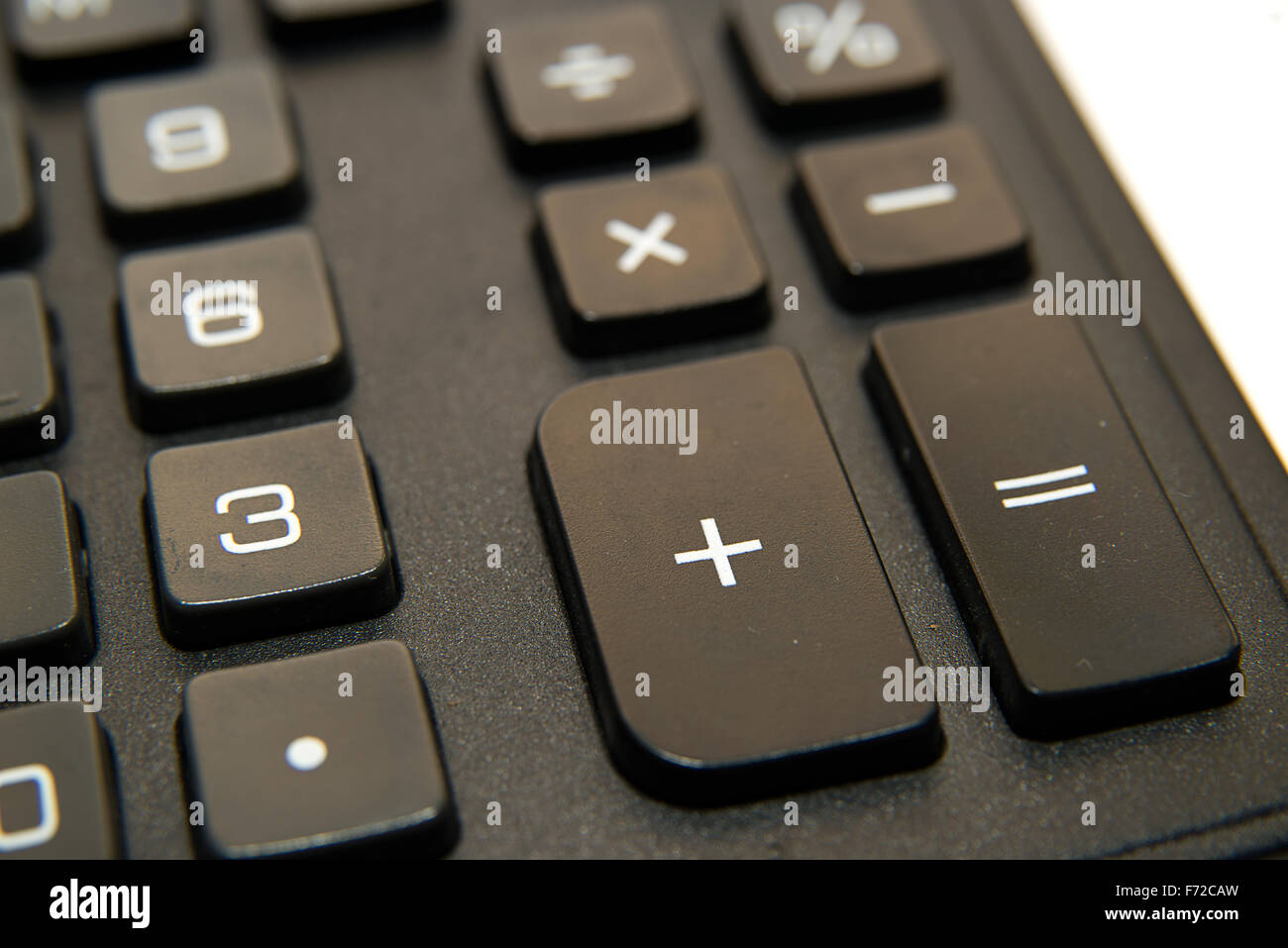 Black button device for computing close-up Stock Photo - Alamy