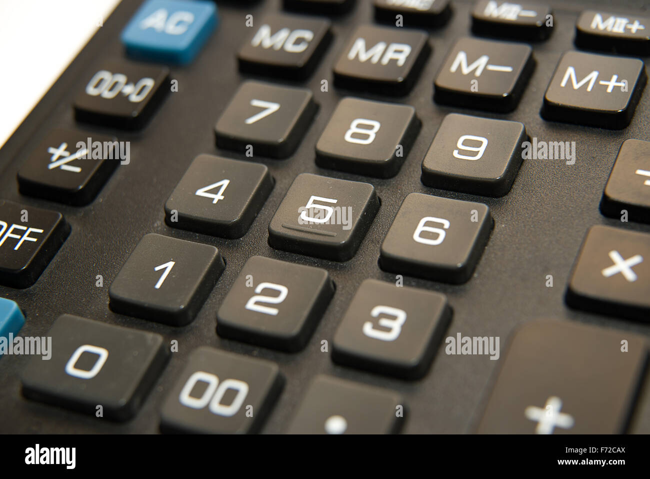 Black button device for computing close-up Stock Photo - Alamy
