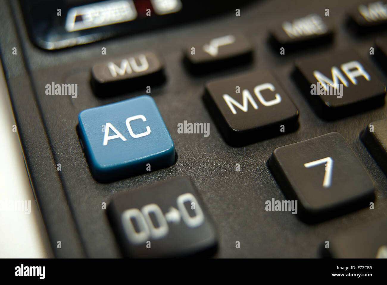 Black button device for computing close-up Stock Photo - Alamy