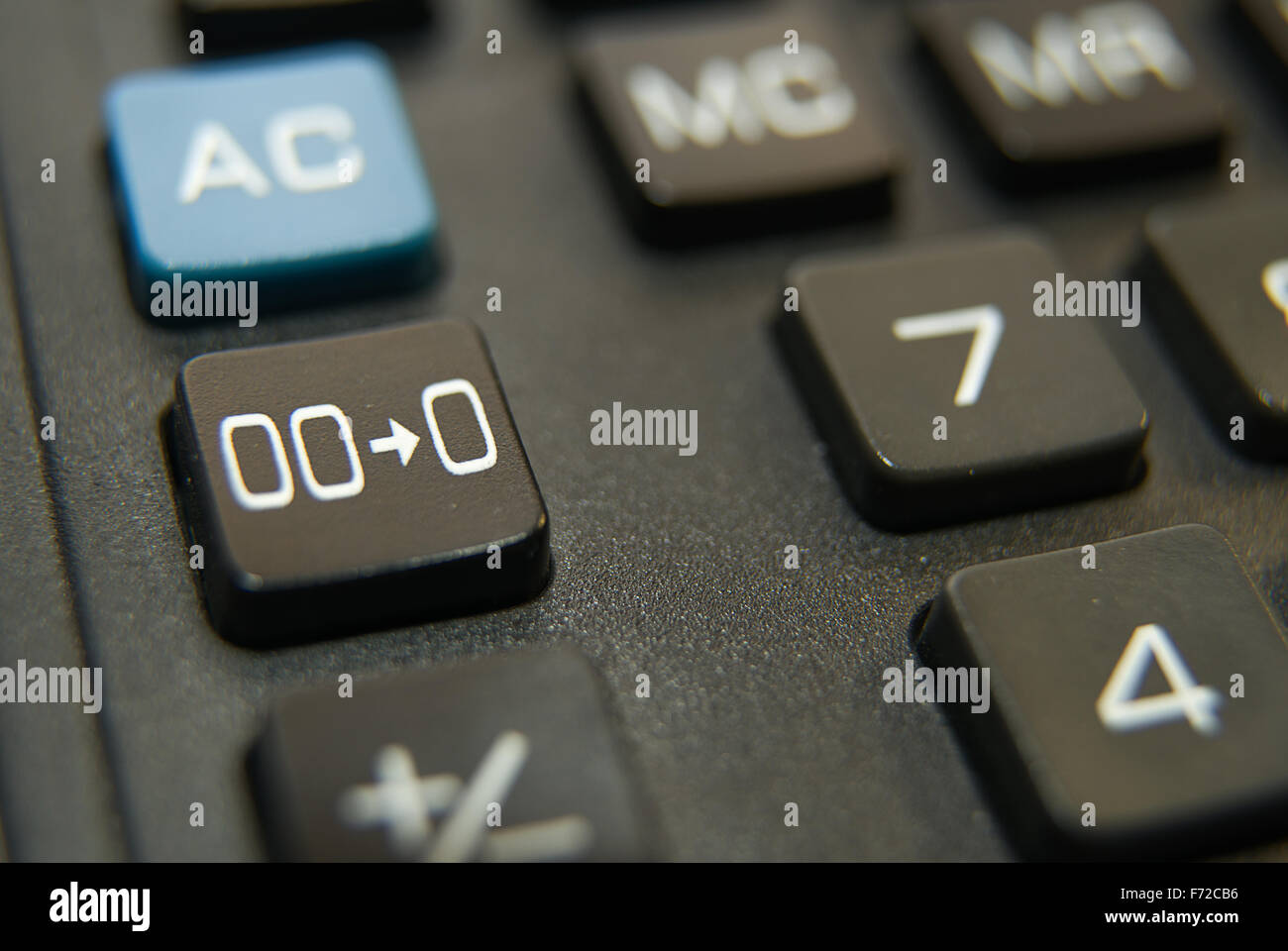 Black button device for computing close-up Stock Photo - Alamy