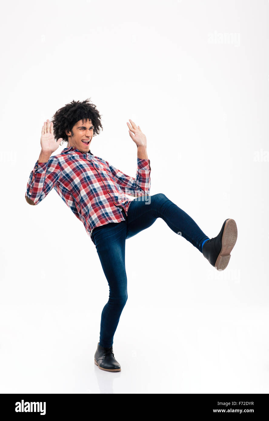 Full length portrait of a young afro american man slipping isolated on ...