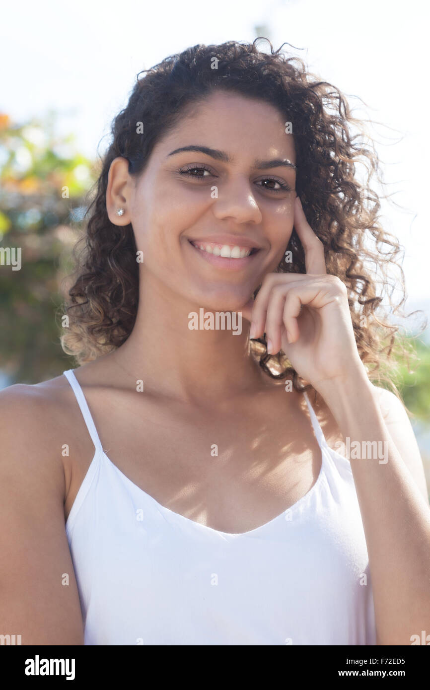 Portrait of a beautiful latin woman in the city Stock Photo - Alamy
