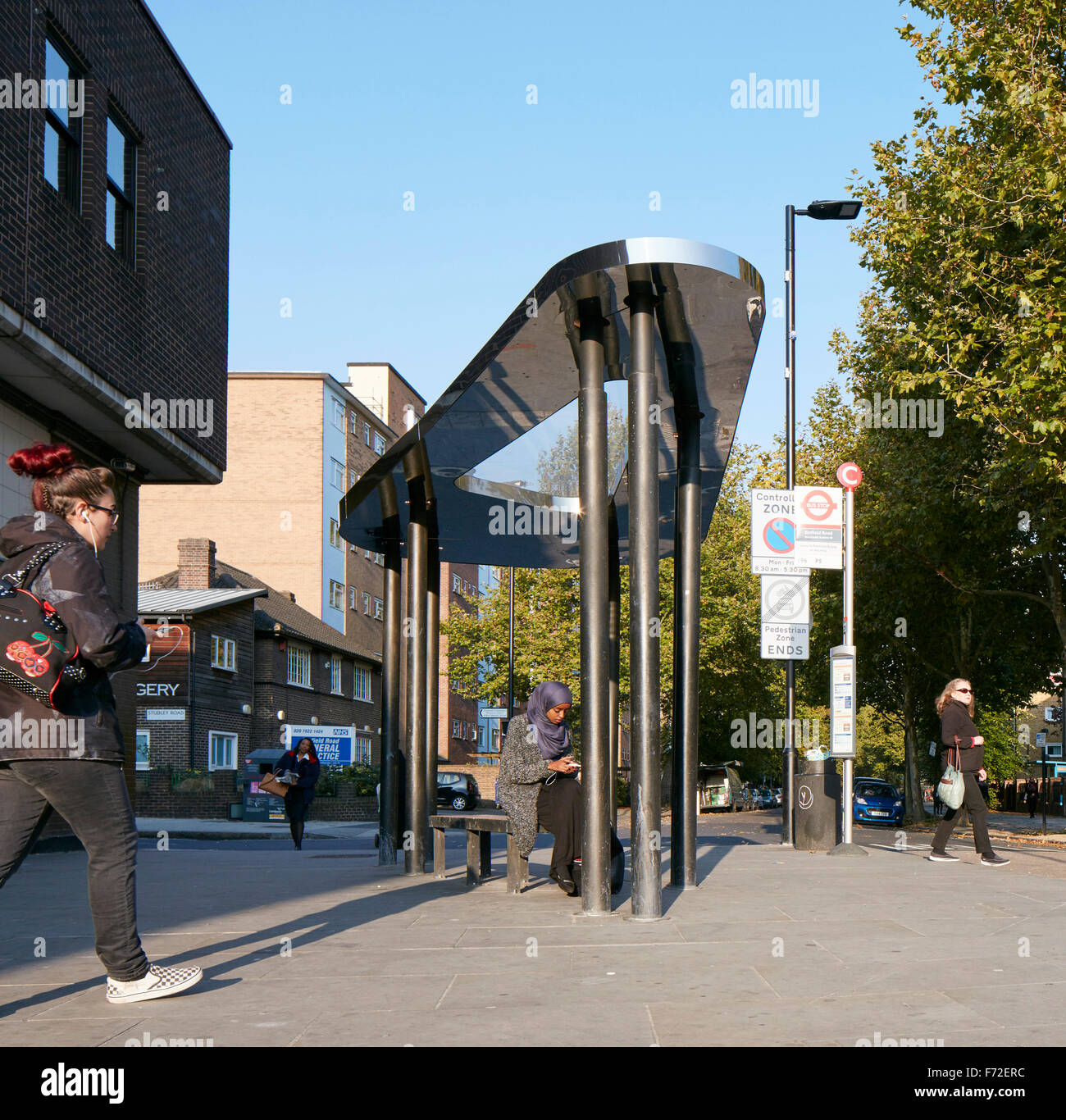Pedestrianised area of Binfield Rod with bus shelter. Binfield Road Bus ...