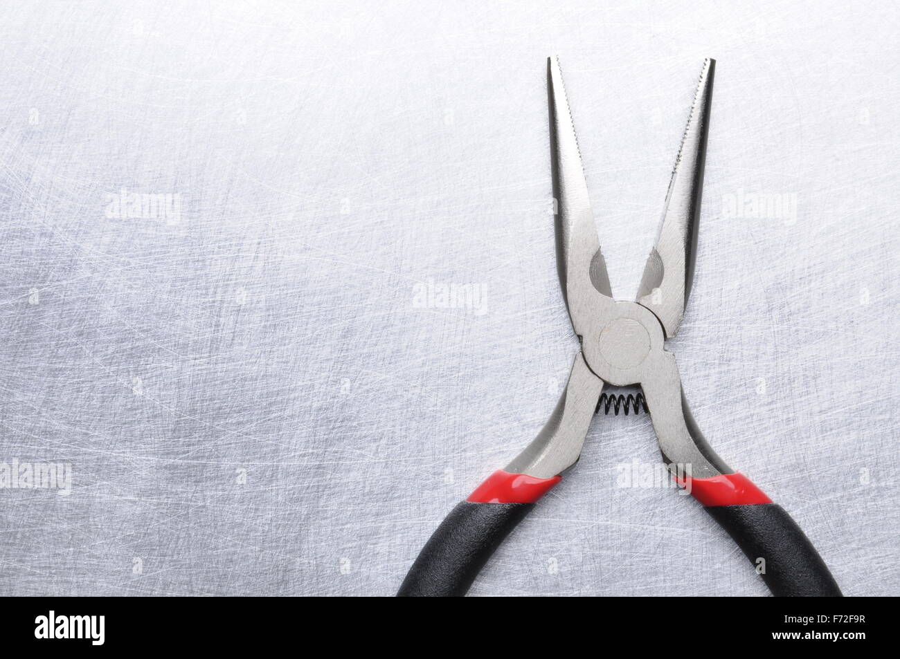 Electrical tools wire cutter, pliers on metal gray surface Stock Photo ...