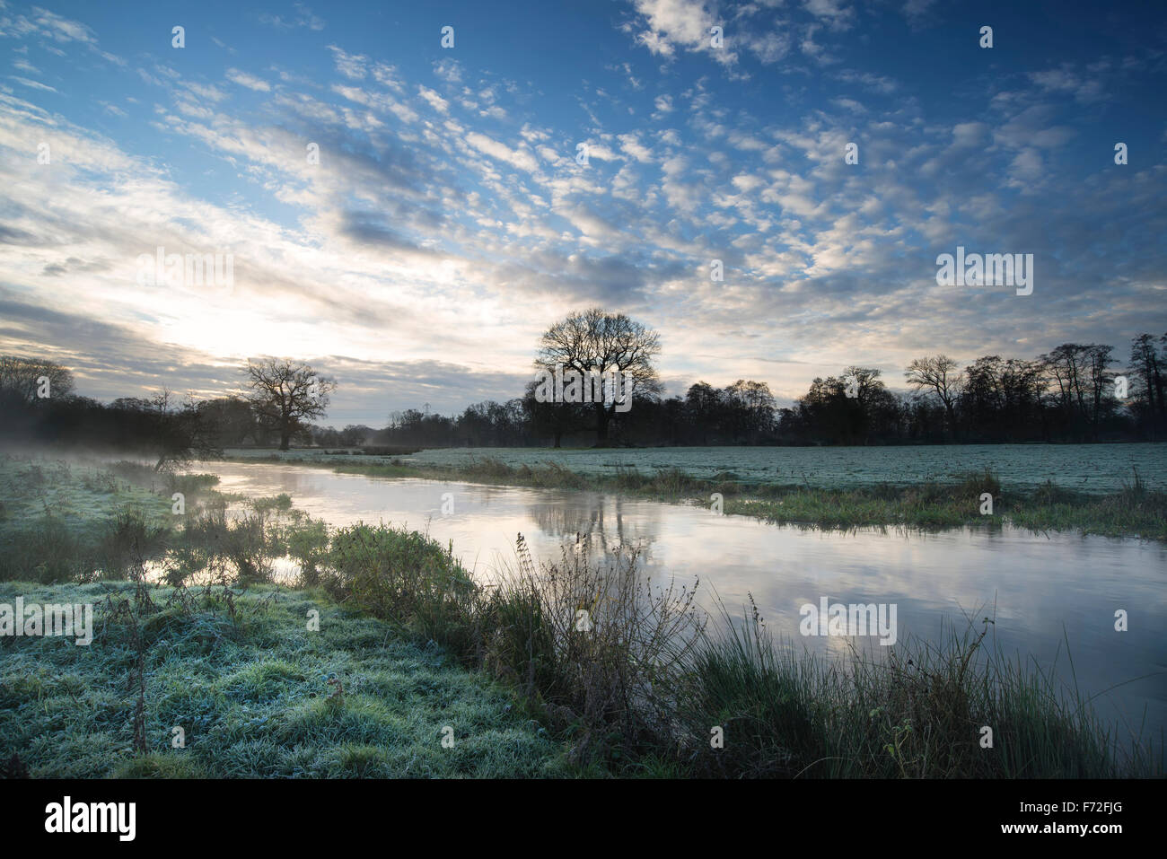Countryside sunrise landscape with dramatic sky and flowing river Stock ...