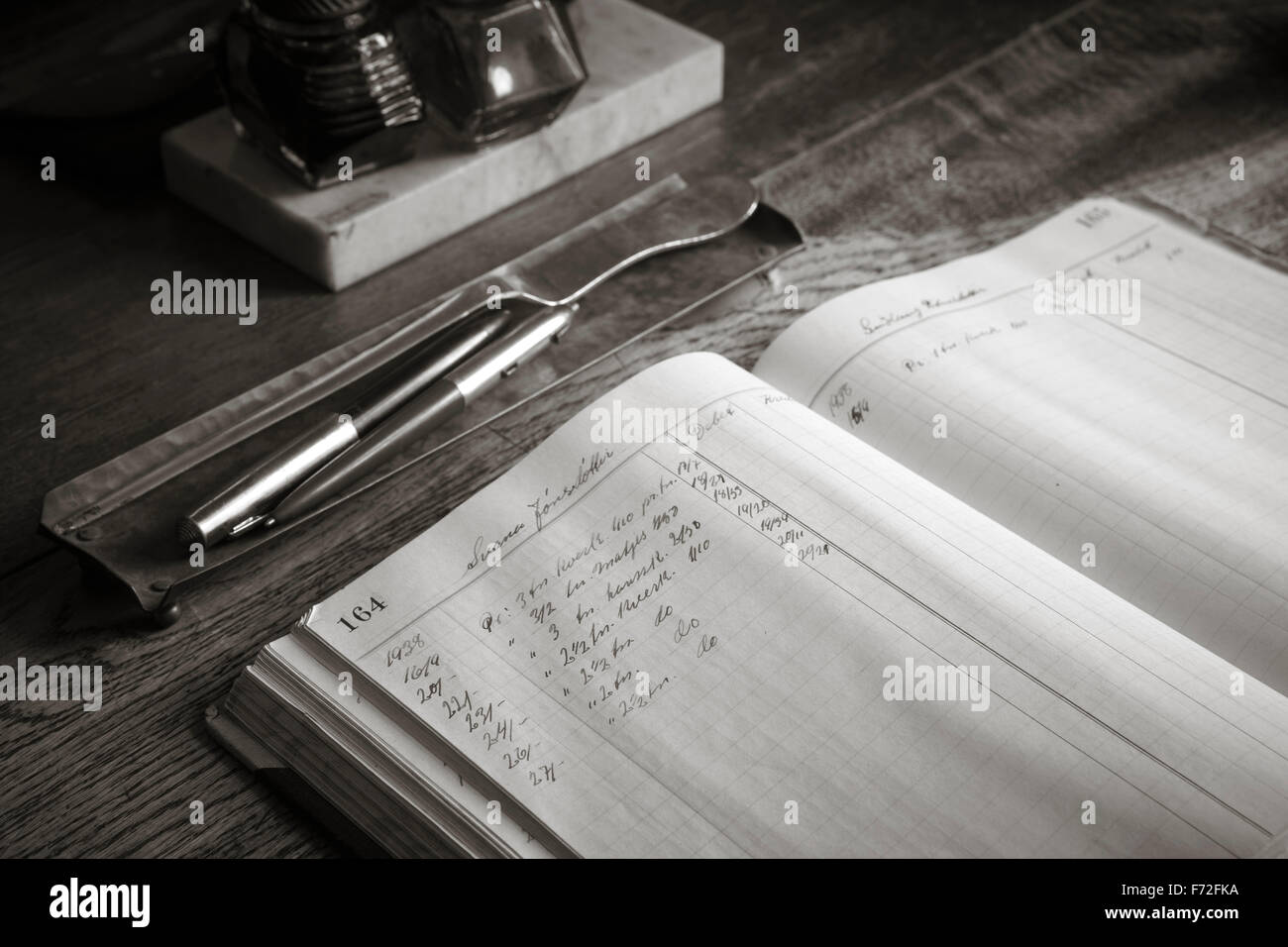 Antique wooden desk ledger black hi-res stock photography and images ...