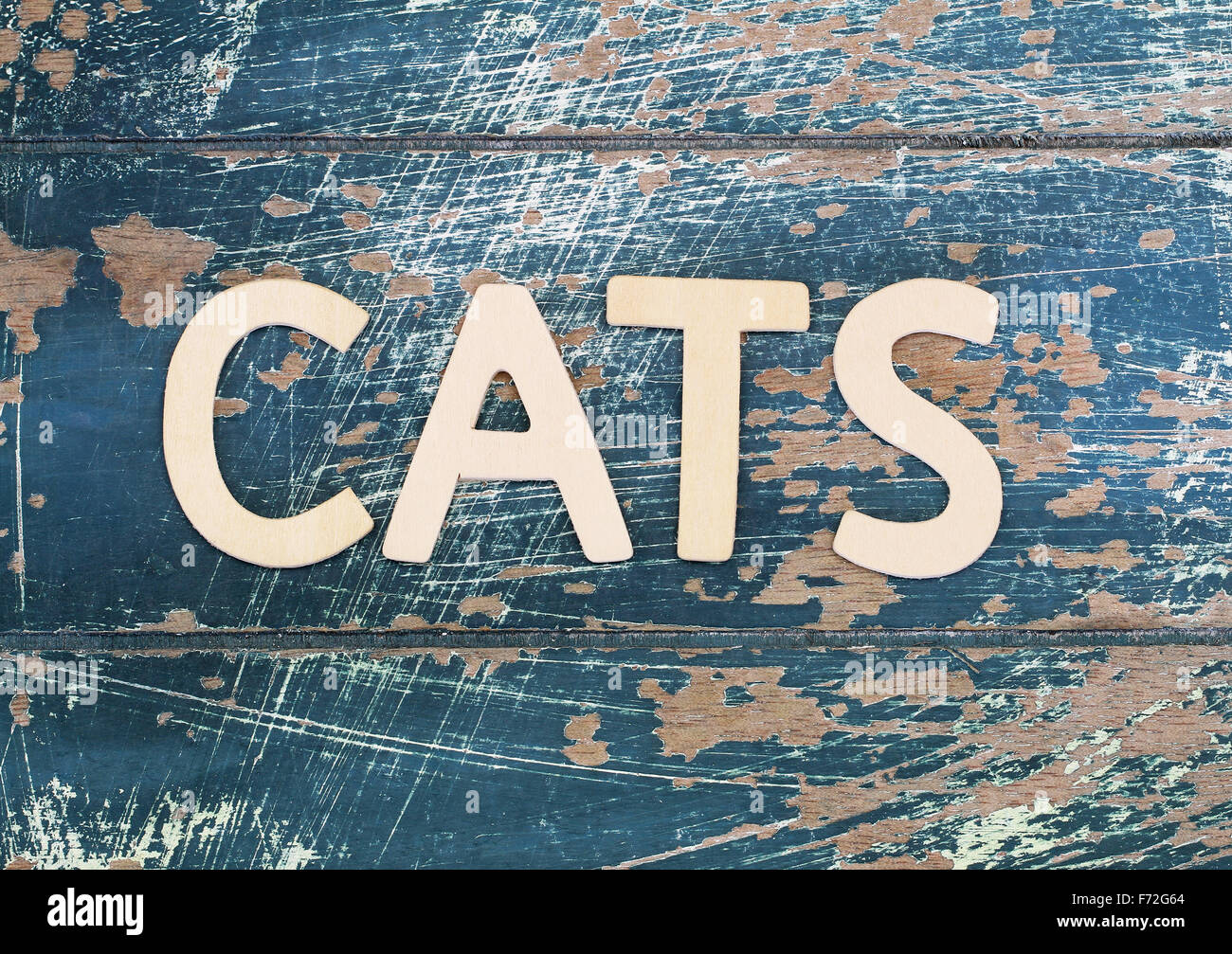 Word cats written with wooden letters on rustic surface Stock Photo - Alamy